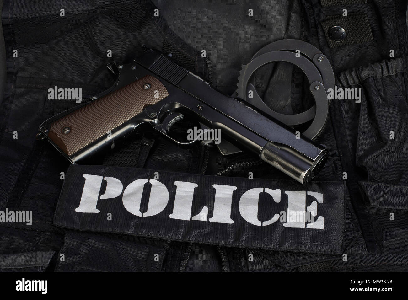Special weapons and tactics police team equipment on black background ...