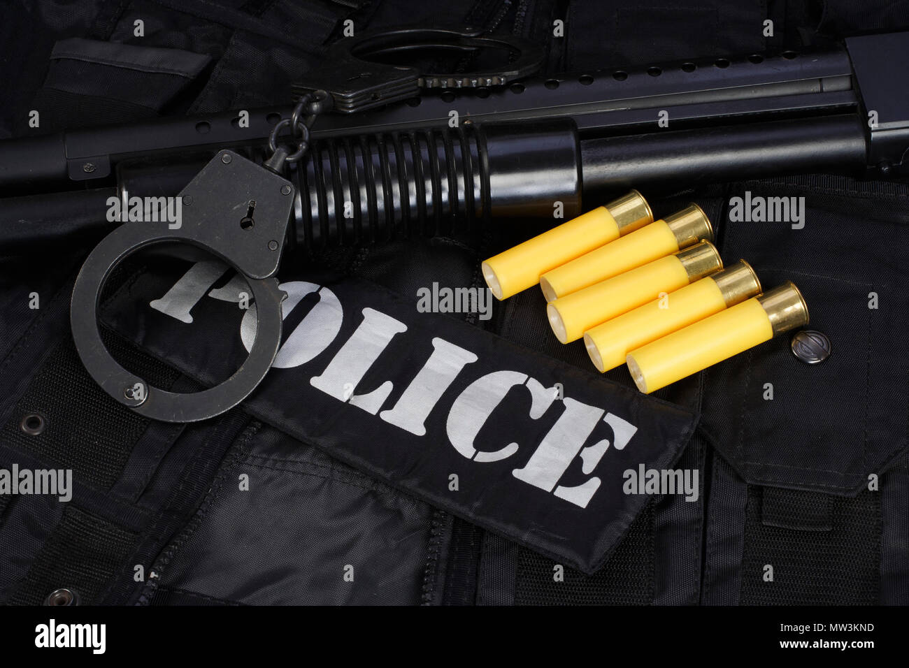 Special weapons and tactics police team equipment on black background ...