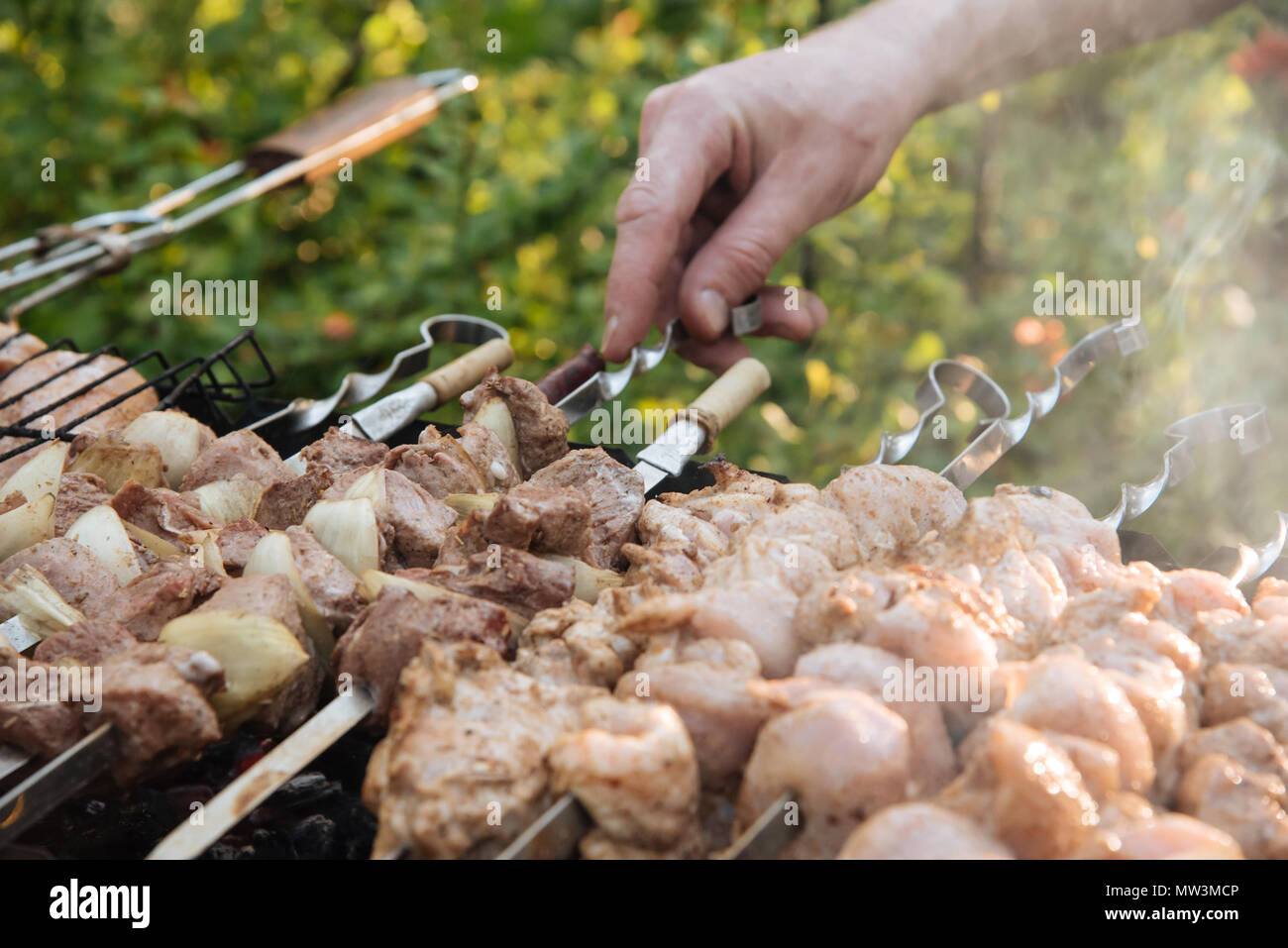 Outdoor barbecue in summer evening close up Stock Photo - Alamy
