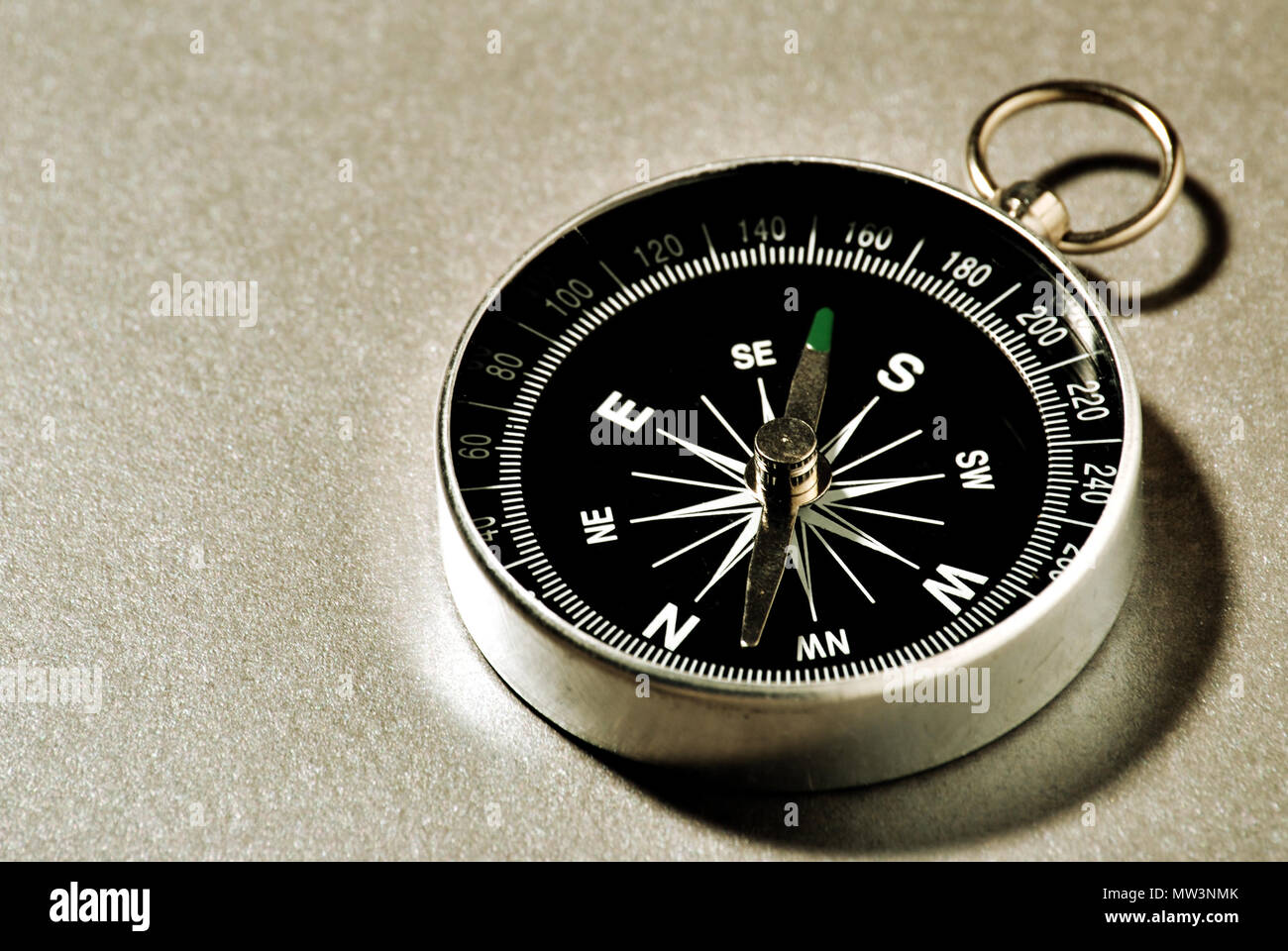 silver compass on metallic background Stock Photo - Alamy