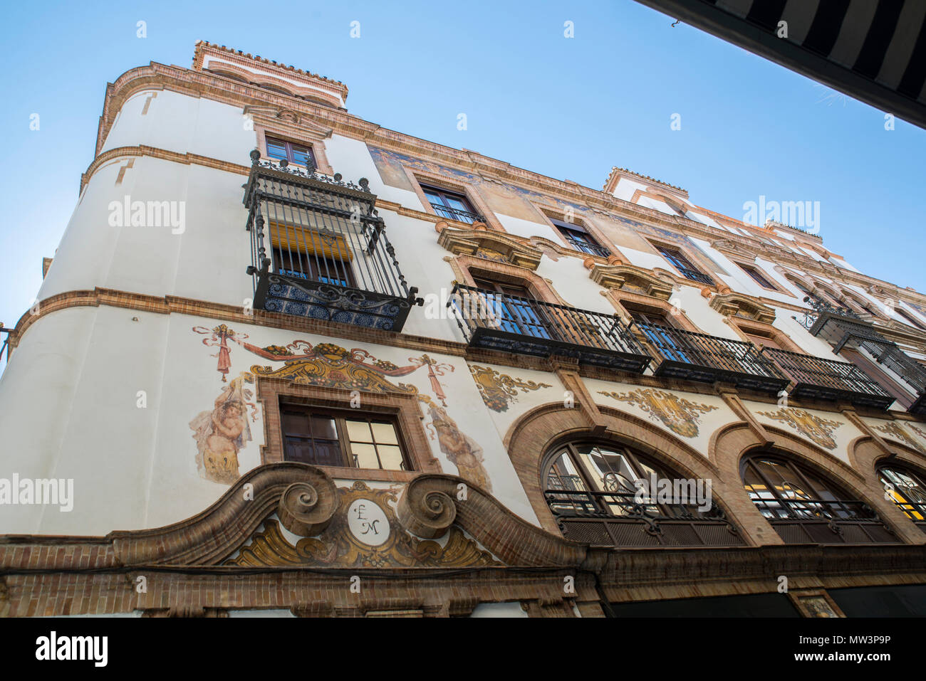 Street and buildings in Seville, Spain Stock Photo - Alamy