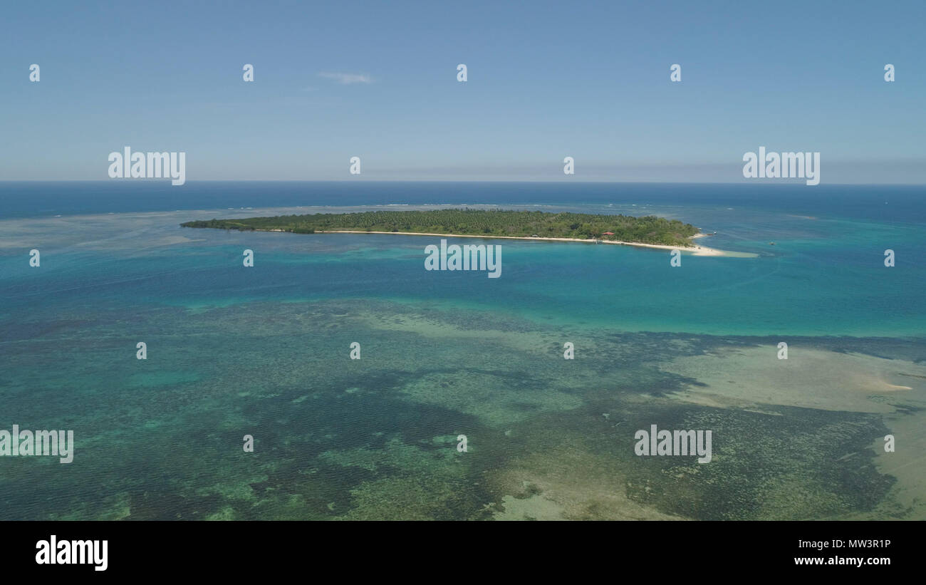 Tropical island with white sandy beach. Aerial view: Magalawa island ...