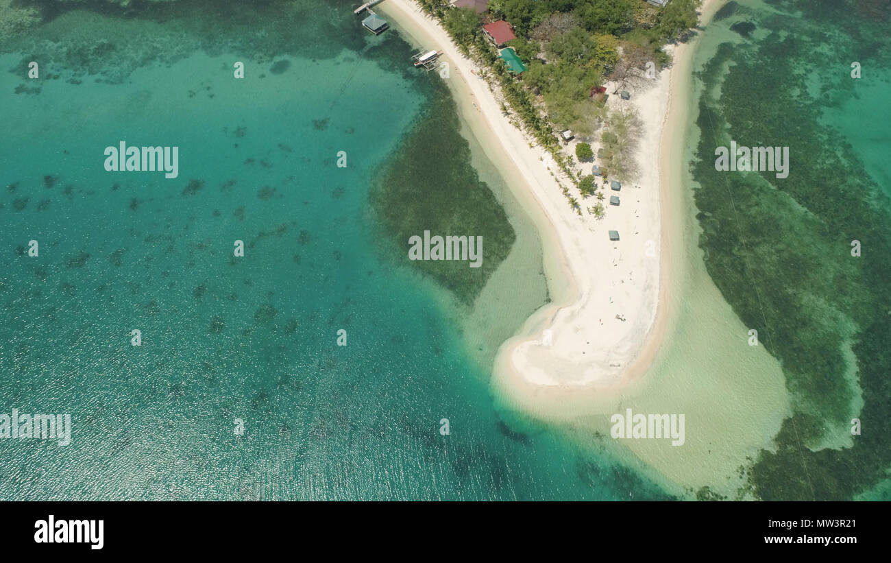 Tropical island with white sandy beach. Aerial view: Magalawa island ...