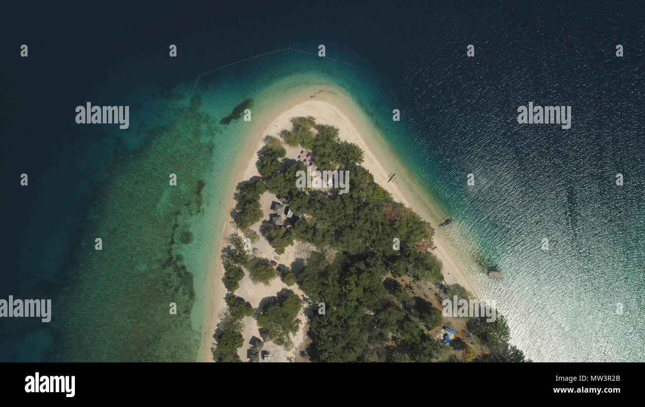 Tropical island with white sandy beach. Aerial view: Putipot island ...