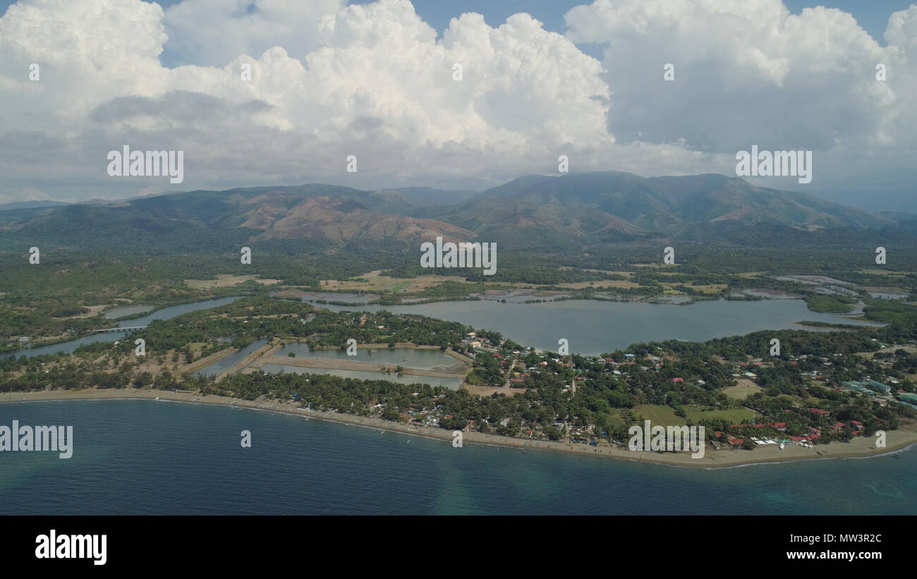 Aerial view of coastline with beach, hotel on the background of ...