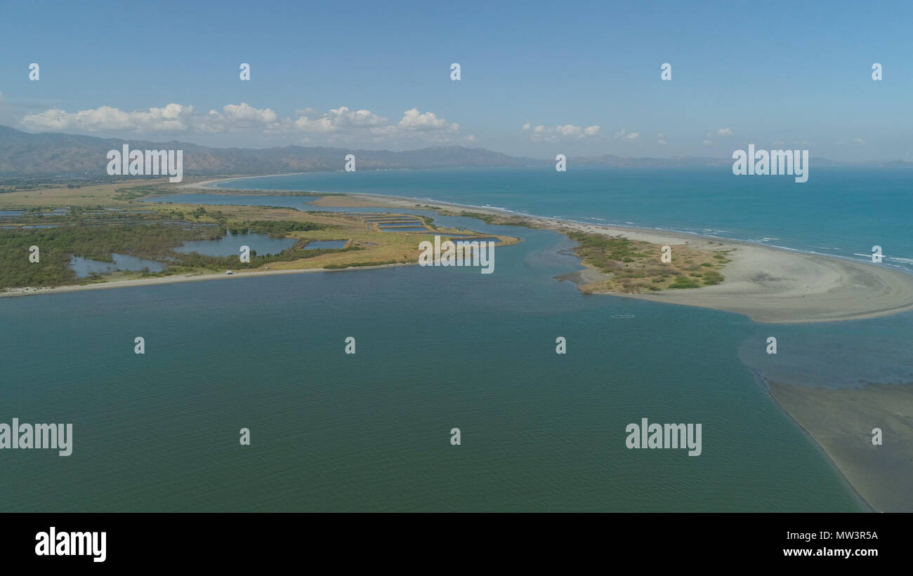 Aerial view of sandy beach Lingayen with azure water on the island ...