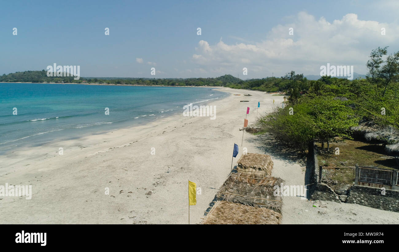 Beautiful tropical beach Cabugao with white sand and palm trees in the ...