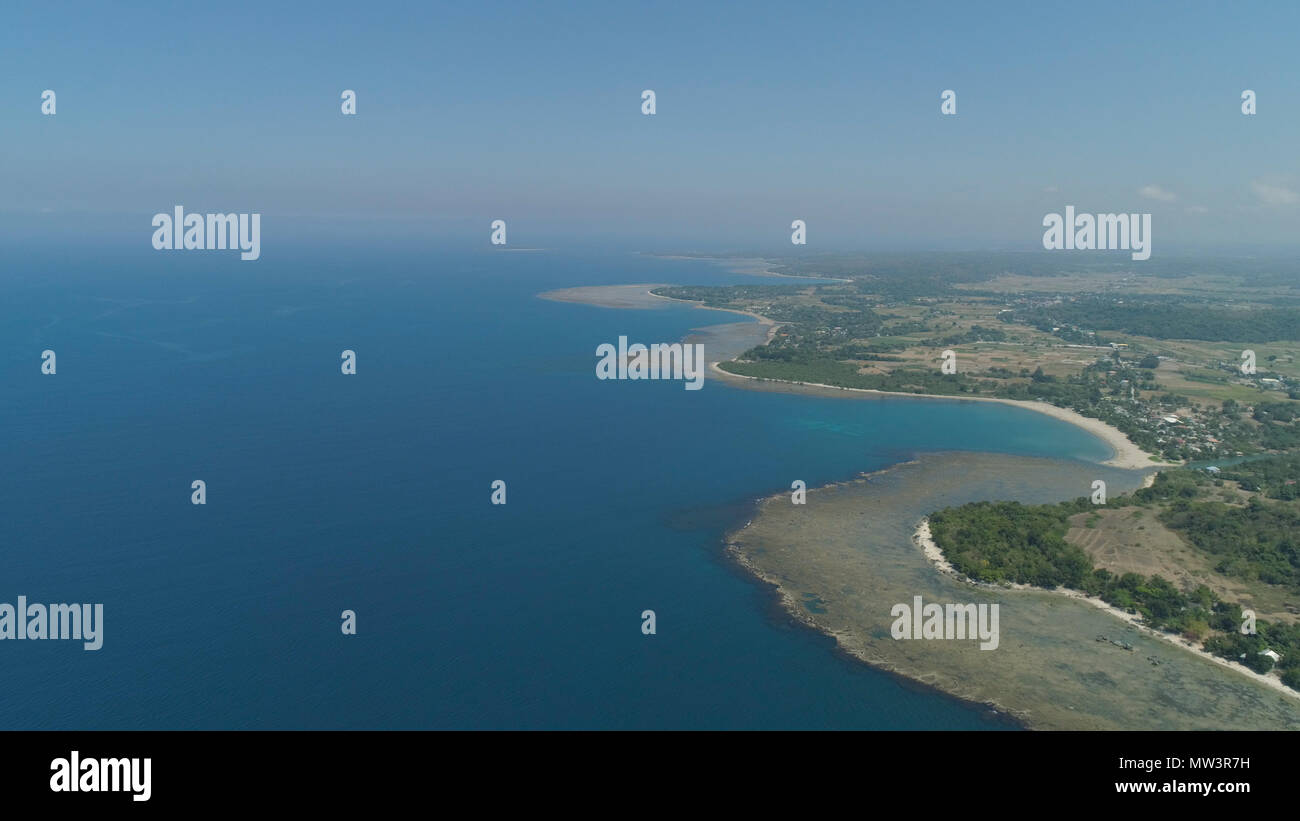 Aerial view of seashore with beaches, lagoons and coral reefs ...