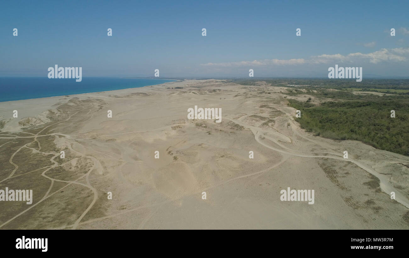 Aerial view of beautiful lonely beach and Paoay sand dune. Philippines ...
