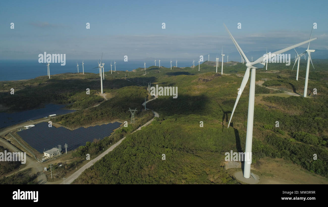 Aerial view of Windmills for electric power production on the seashore ...