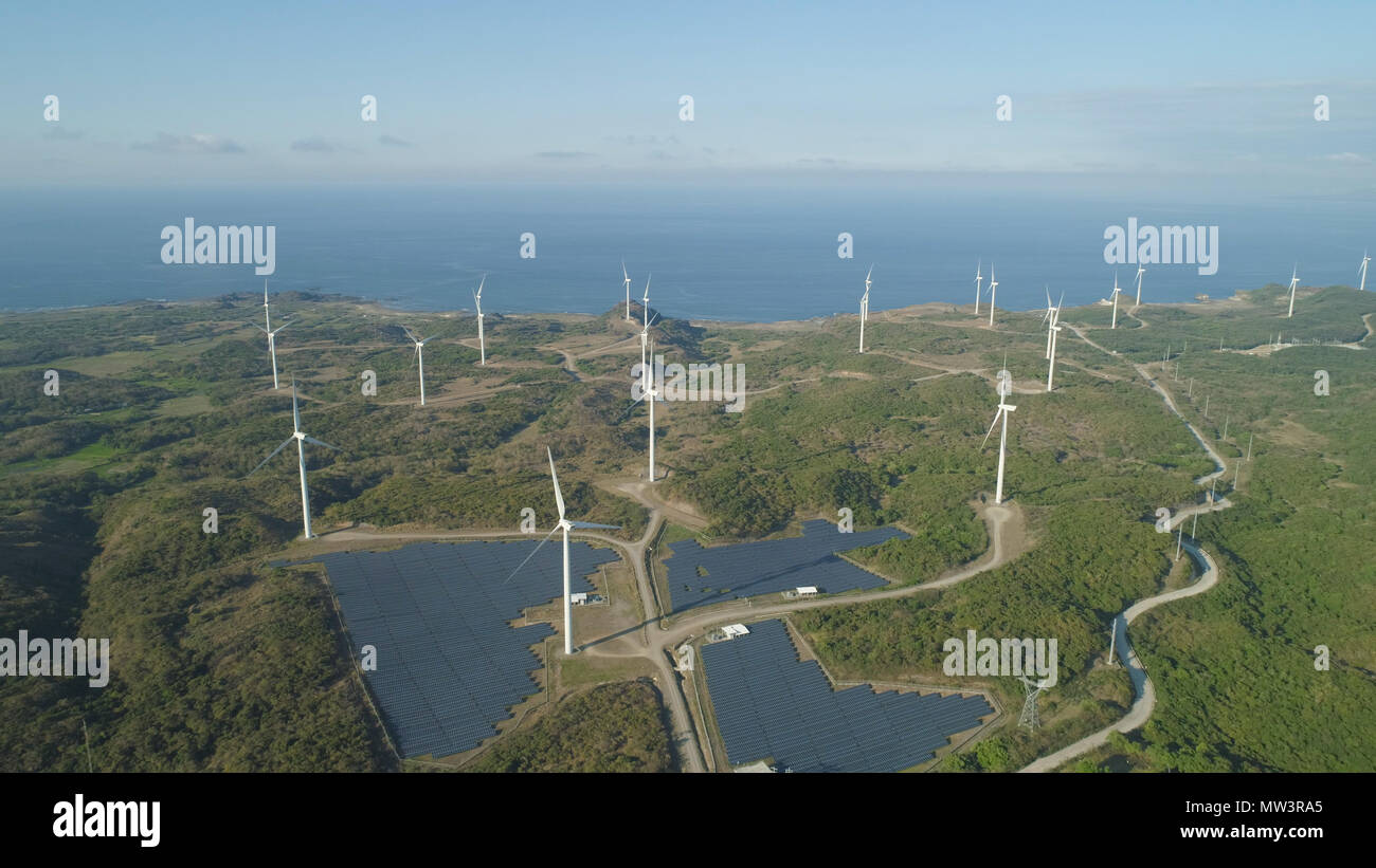 Aerial view of Windmills for electric power production on the seashore ...