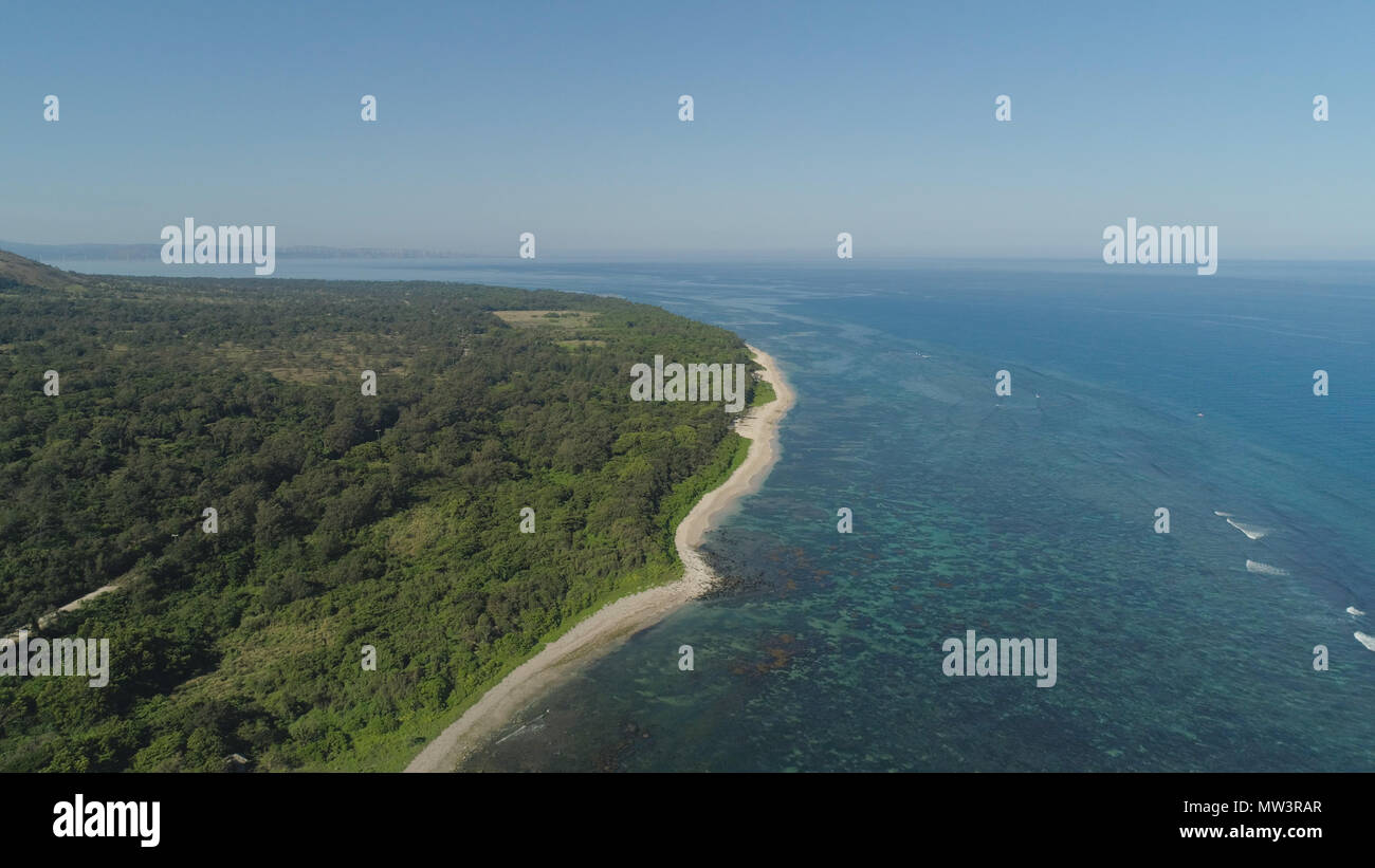 Aerial view of seashore with beach, lagoons and coral reefs ...