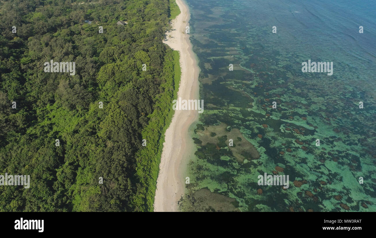 Aerial view of seashore with beach, lagoons and coral reefs ...
