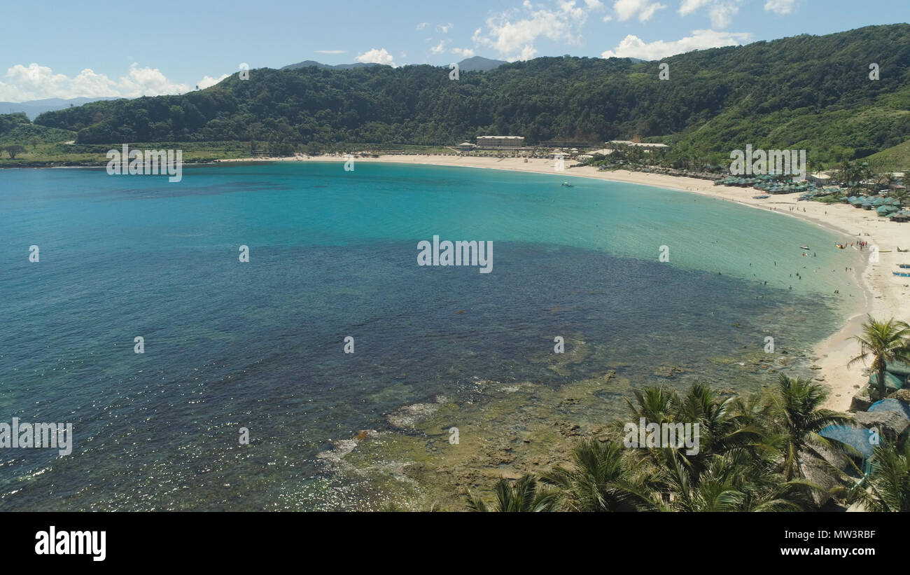 Aerial view of beautiful tropical beach with turquoise water in blue ...