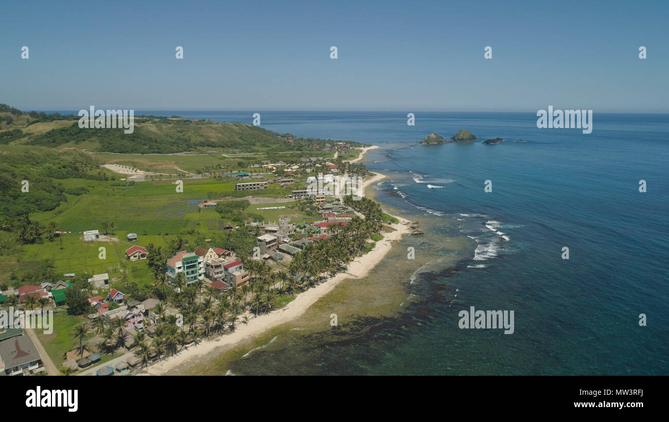 Aerial view of beautiful tropical beach with turquoise water in blue ...