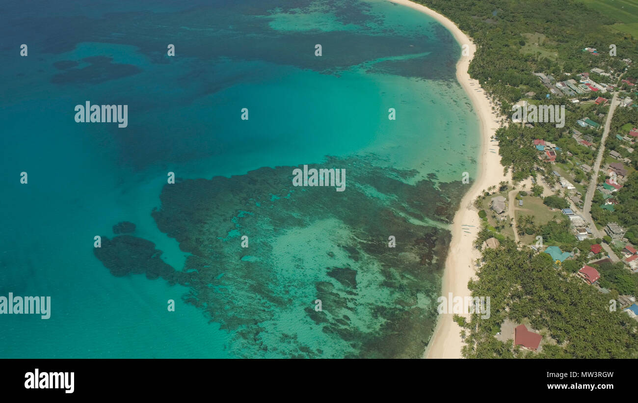 Aerial view of beautiful tropical beach Saud with turquoise water in ...