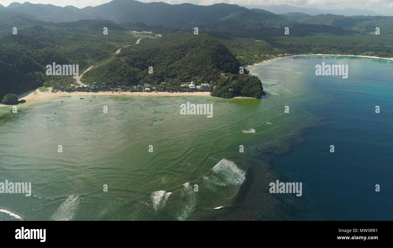 Aerial view of beautiful tropical beach with turquoise water in blue ...