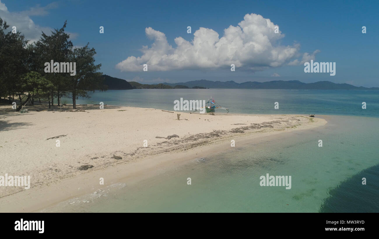 Aerial view of beautiful tropical beach with turquoise water in blue ...