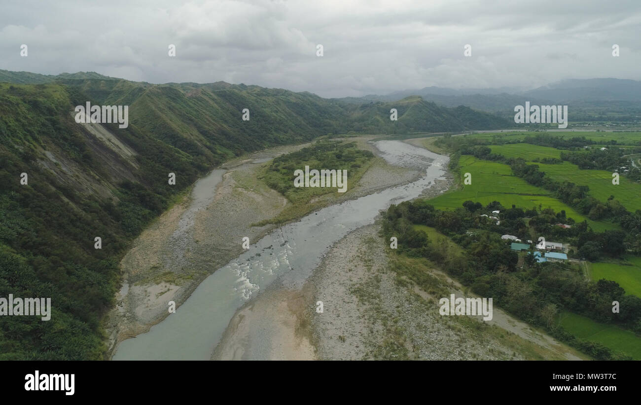 Mountain valley with river, farmland in the Philippines, Luzon. Aerial ...