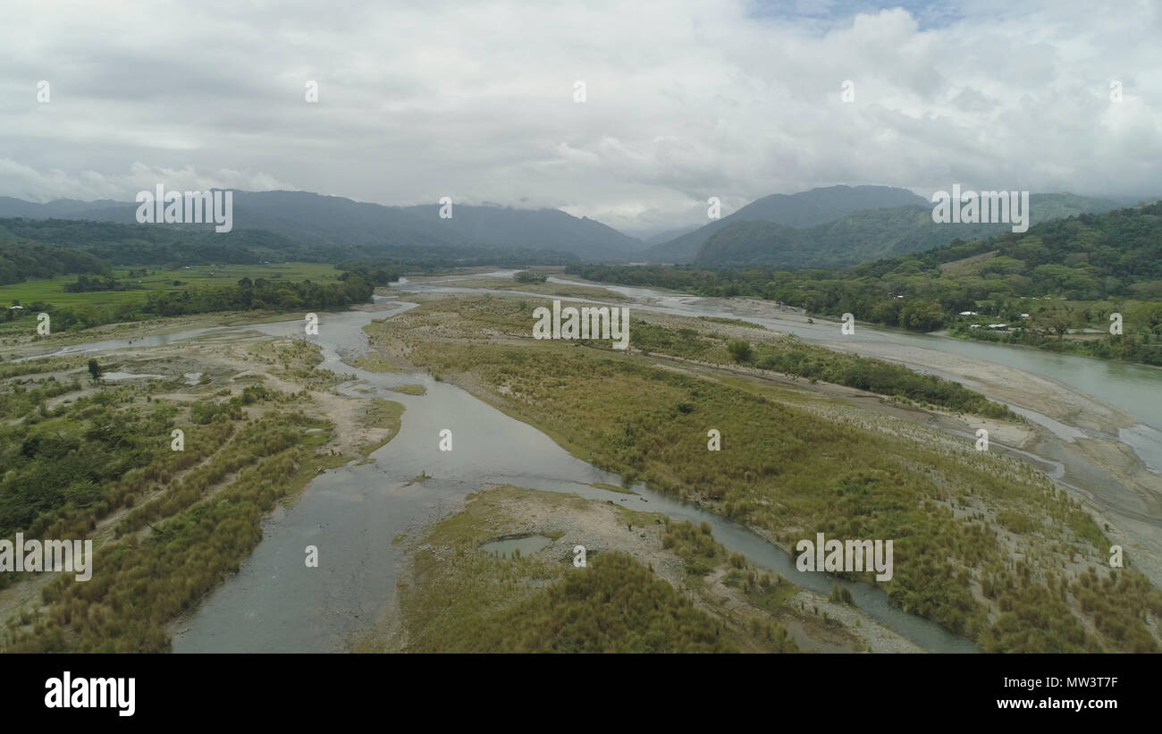 Mountain valley with river, farmland in the Philippines, Luzon. Aerial ...