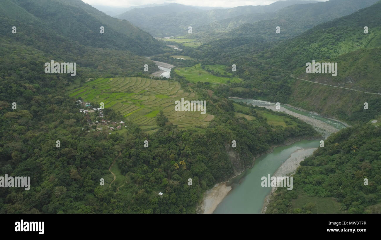 Aerial view of mountain valley in the cordillera, river, rice terraces ...