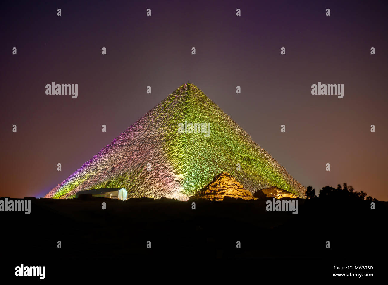Landscape view at the Pyramids of Giza at night during light and sound ...