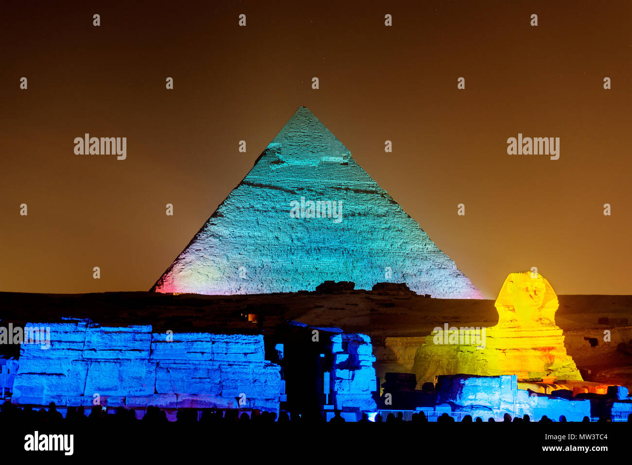 Landscape view at the Pyramids of Giza at night during light and sound ...