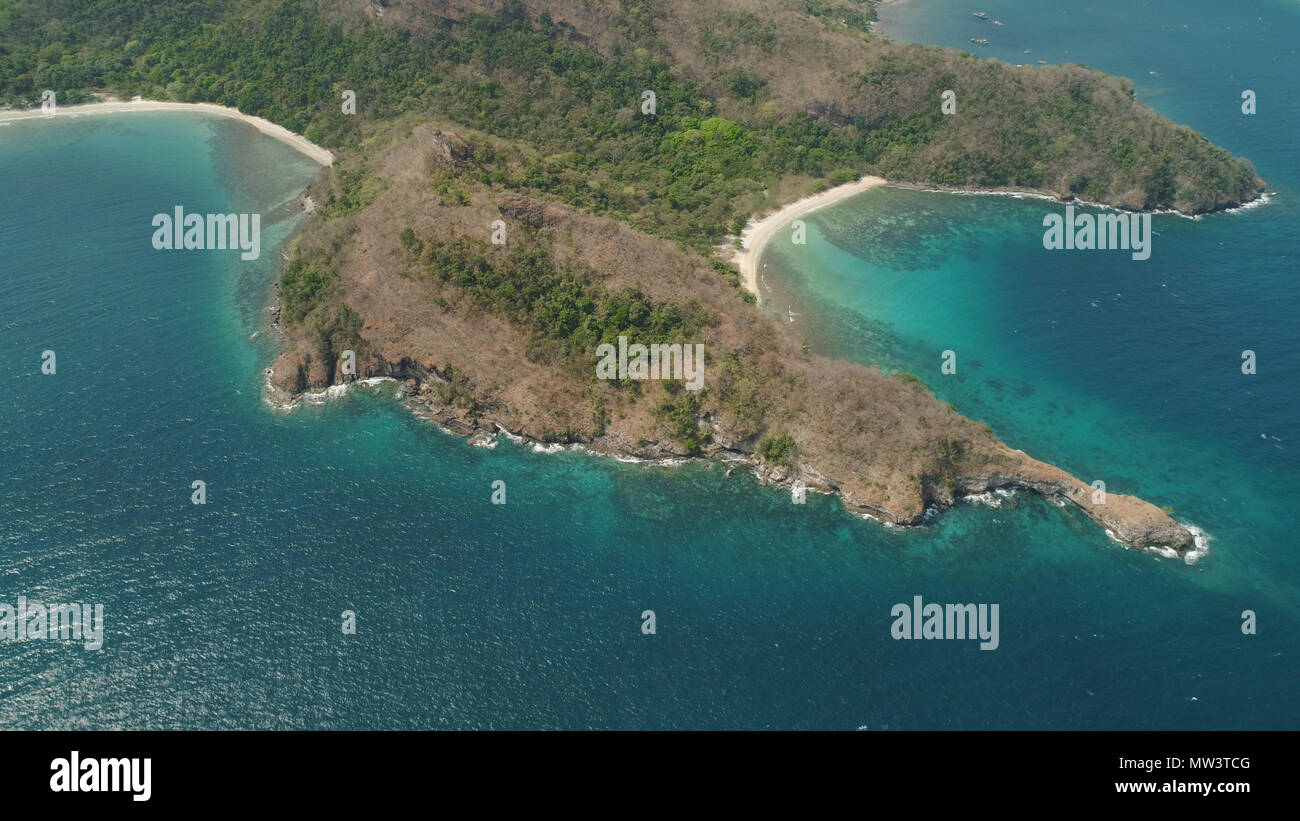 Aerial view of seashore with beach, lagoons and coral reefs ...