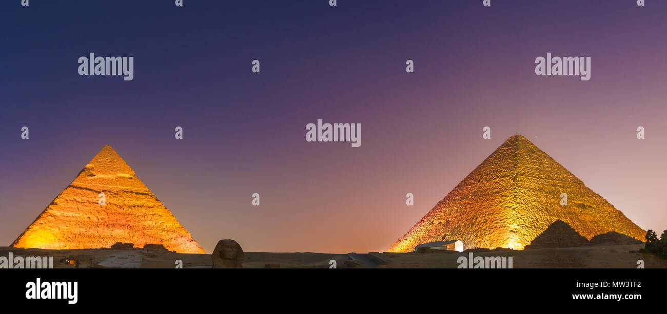 Landscape view at the Pyramids of Giza at night during light and sound ...