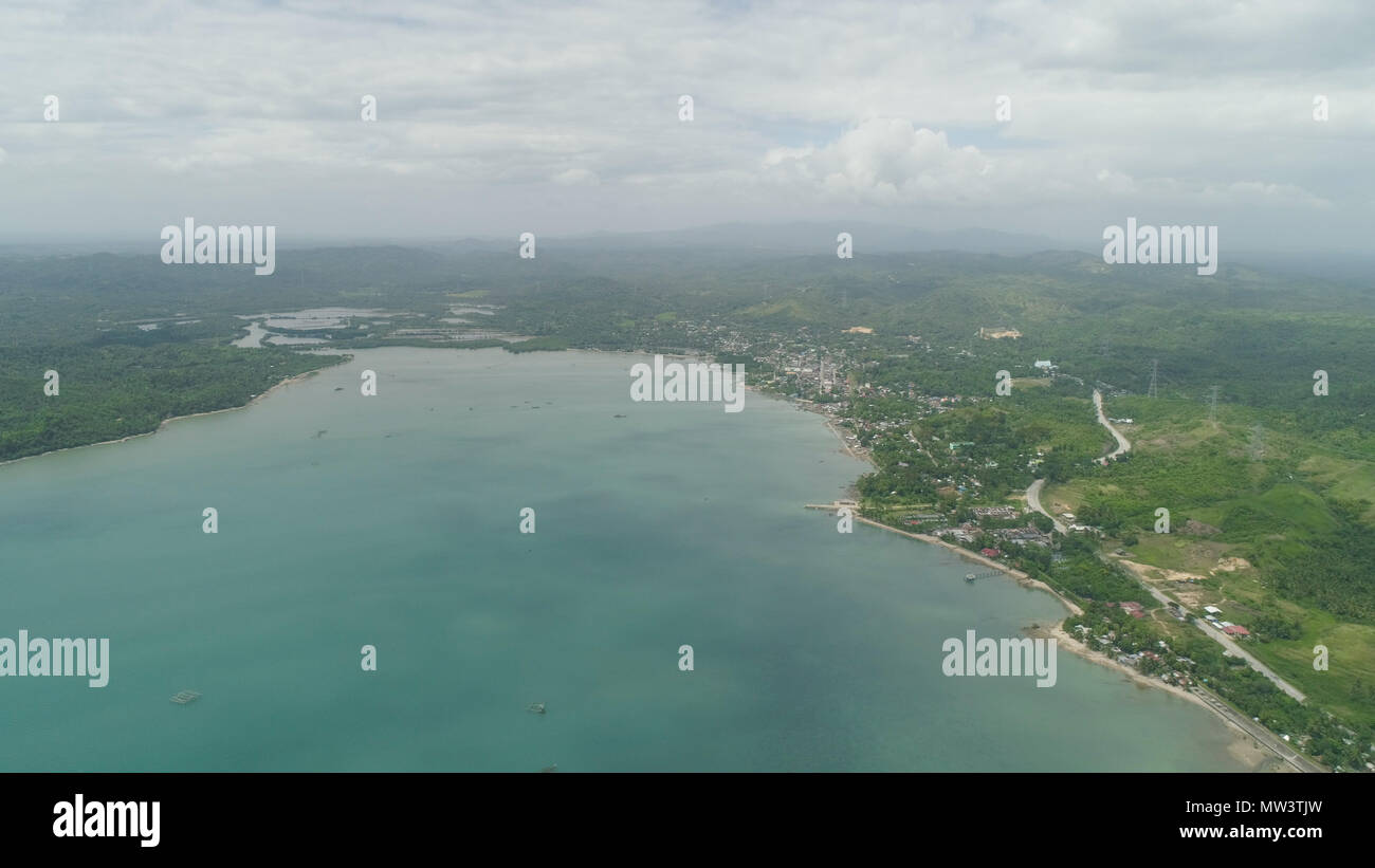 Aerial view of seashore with beach, lagoons and coral reefs ...