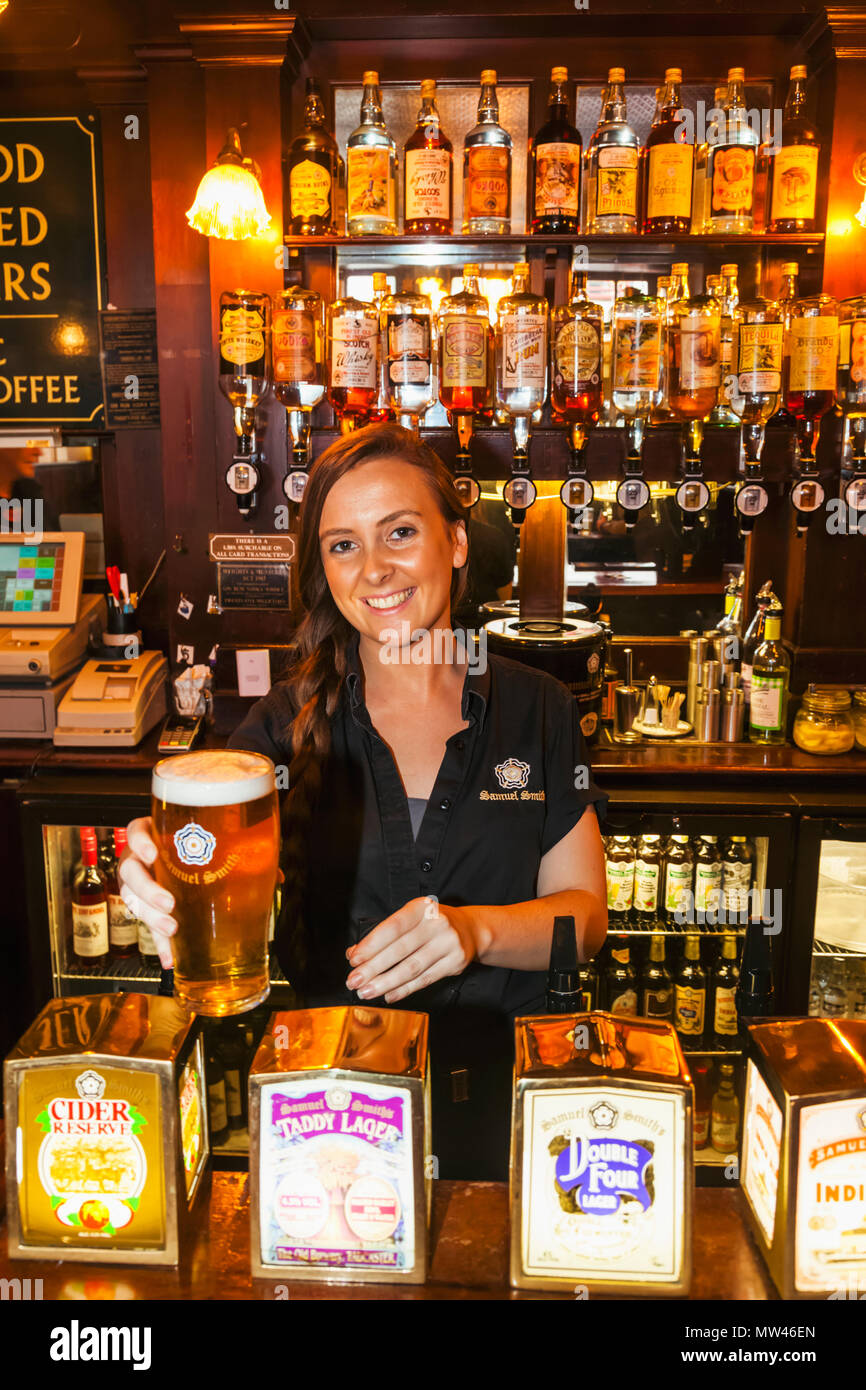 England, London, Southwark, Anchor Tap Pub, Barmaid Serving Beer Stock ...