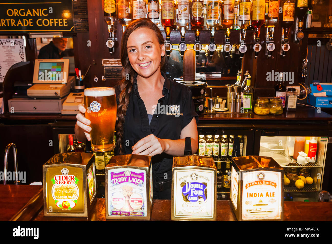 England, London, Southwark, Anchor Tap Pub, Barmaid Serving Beer Stock ...
