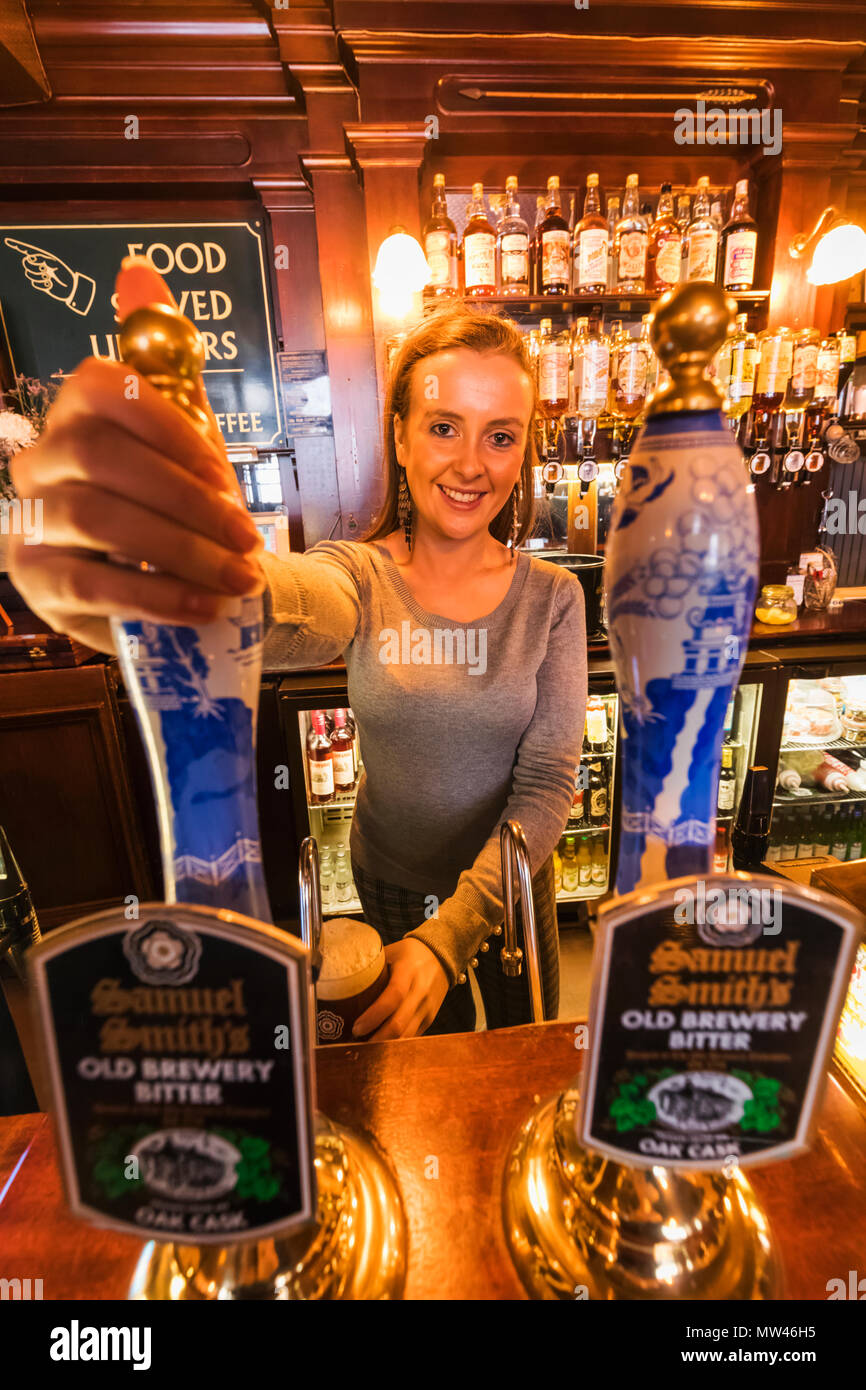 England, London, Southwark, Anchor Tap Pub, Barmaid Serving Beer Stock ...