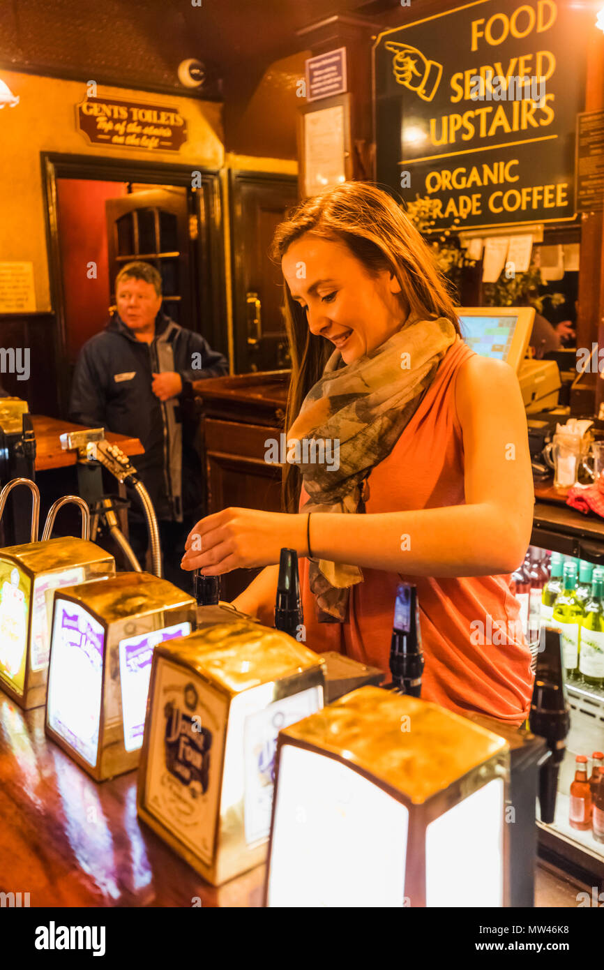 England, London, Southwark, Anchor Tap Pub, Barmaid Serving Beer Stock ...