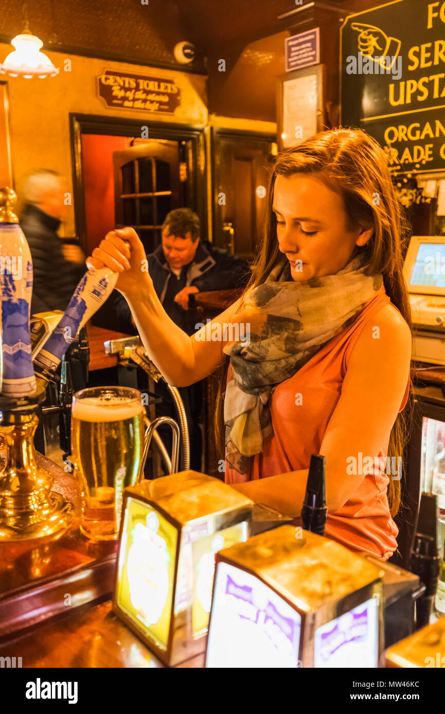England, London, Southwark, Anchor Tap Pub, Barmaid Serving Beer Stock ...