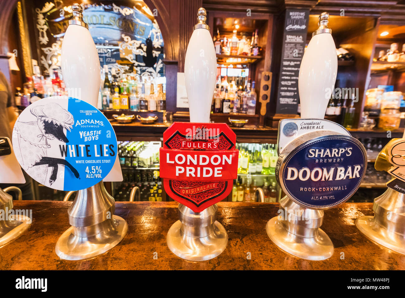England london beer pump handles hi-res stock photography and images ...