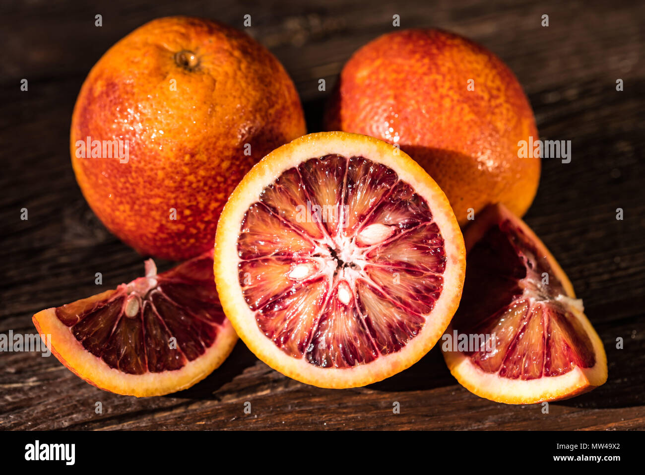Whole and cut ripe juicy Sicilian Blood oranges Stock Photo - Alamy