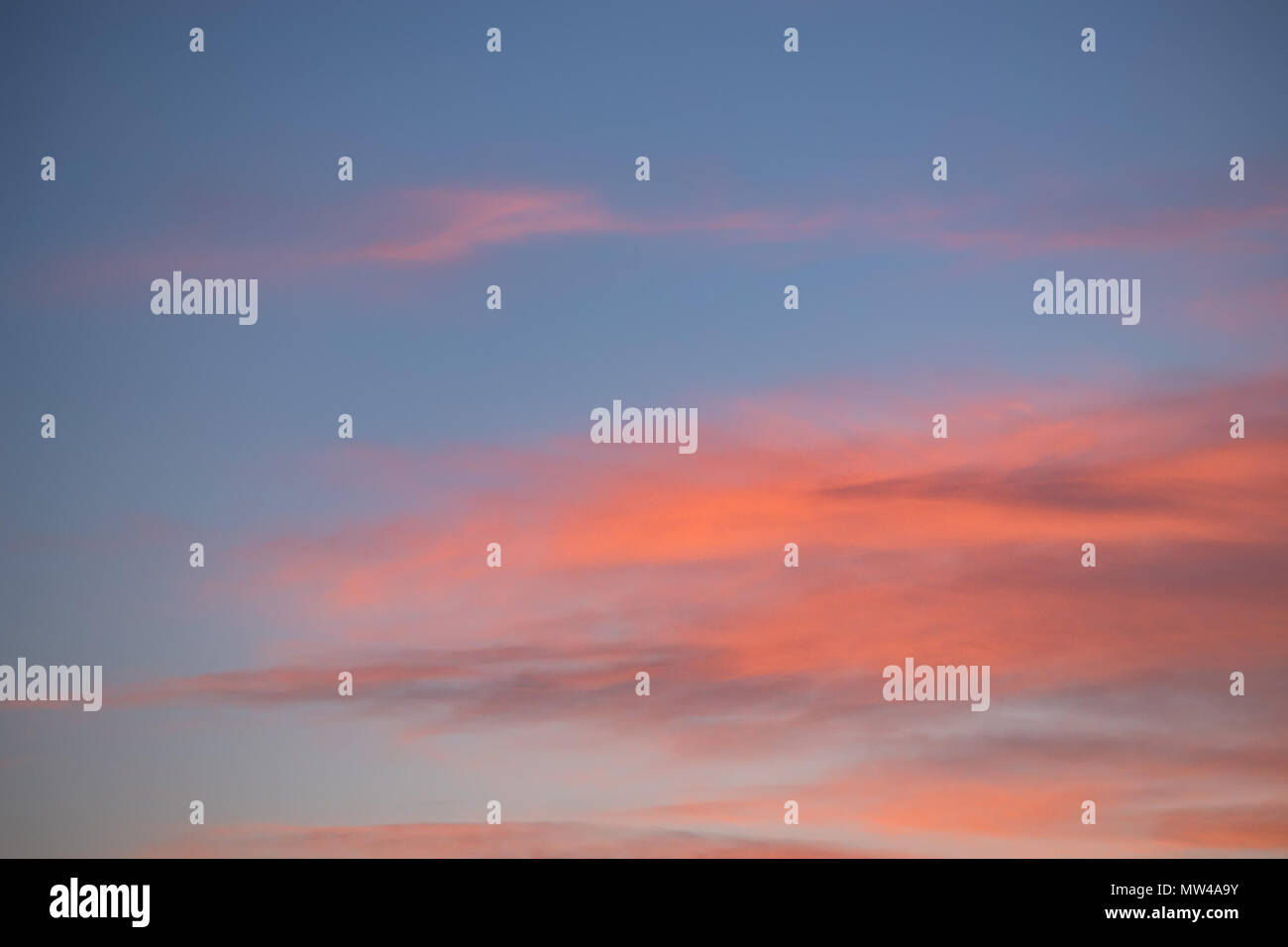 Dramatic sunset and sunrise sky with pink clouds Stock Photo - Alamy