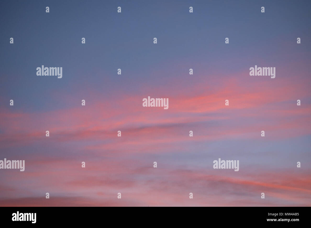 Dramatic sunset and sunrise sky with pink clouds Stock Photo - Alamy