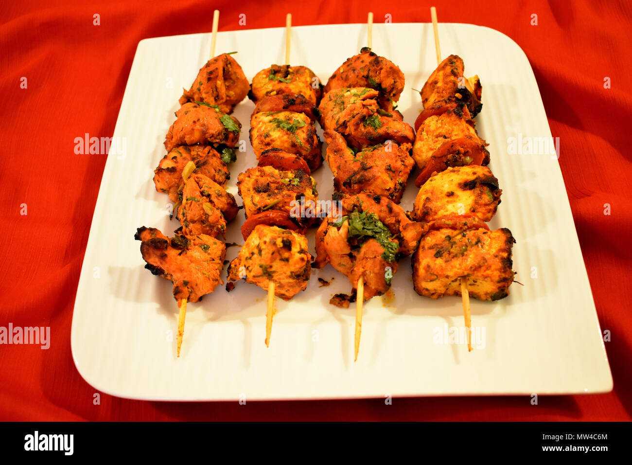 Chicken tikka and paneer(cottage cheese) tikka on skewers Stock Photo ...