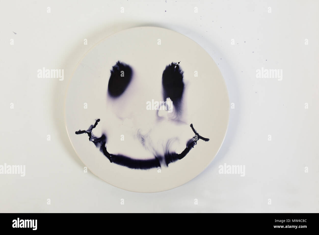 drawing dissolved with water Stock Photo - Alamy