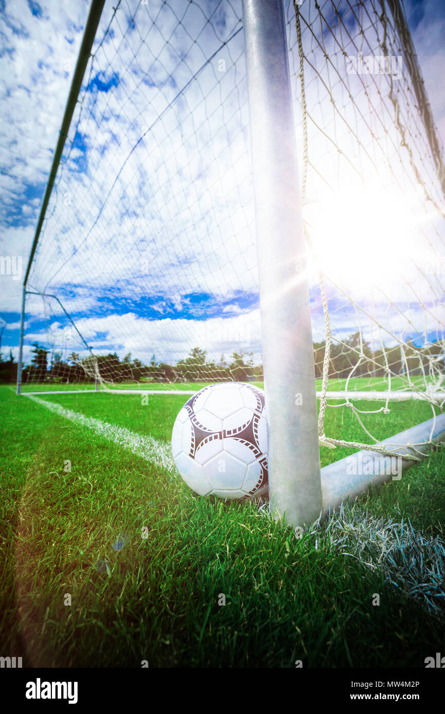 Soccer ball near goal post hi-res stock photography and images - Alamy
