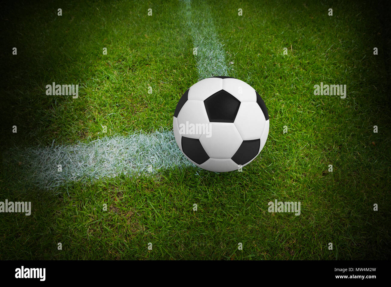 Soccer ball on marking line Stock Photo - Alamy
