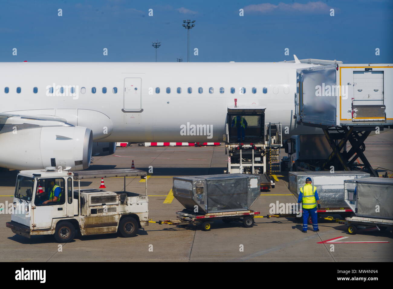 loading of an airplane at the airport Stock Photo - Alamy