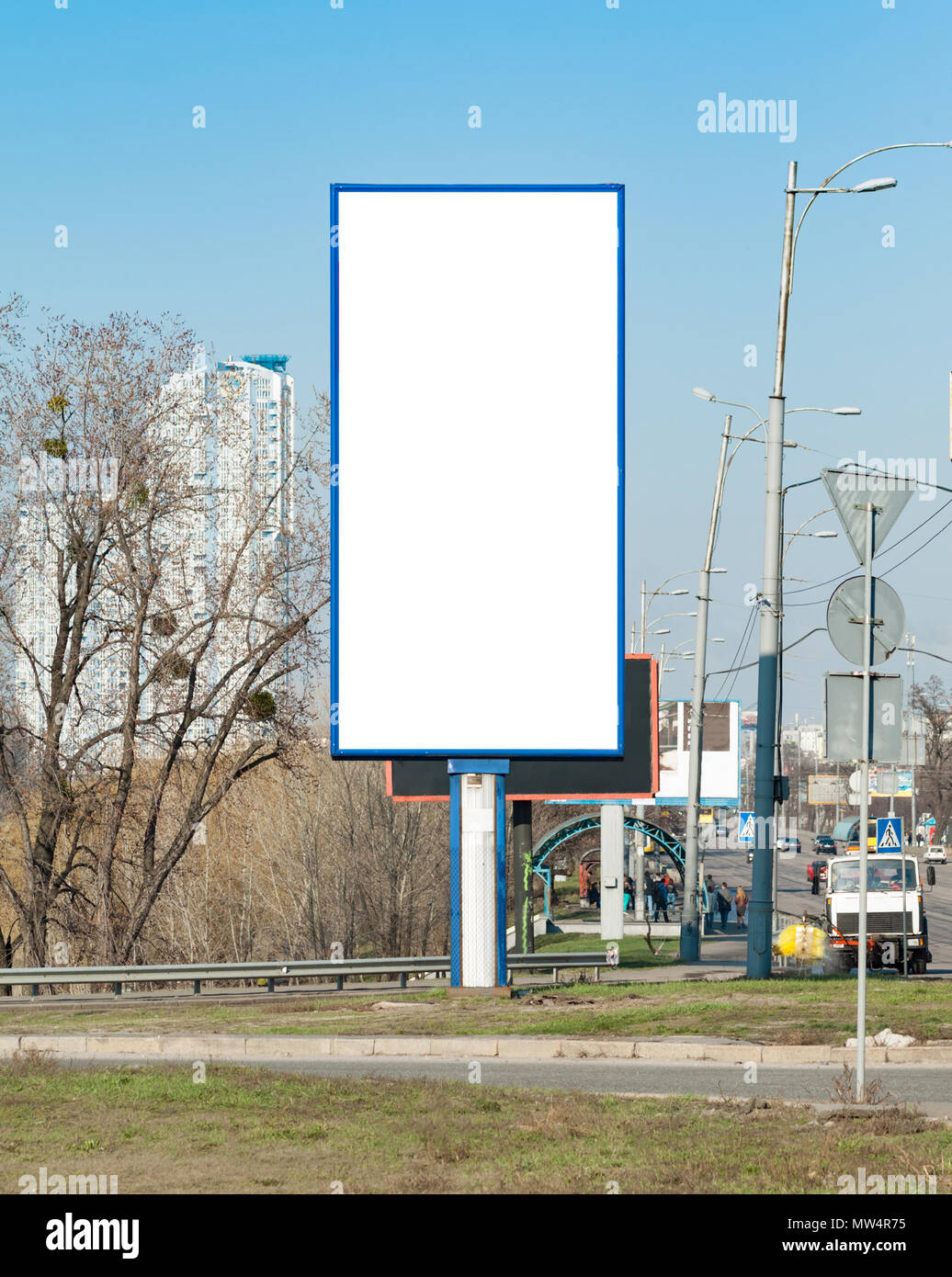 Blank vertical billboard near a highway. Background for mock-up Stock ...