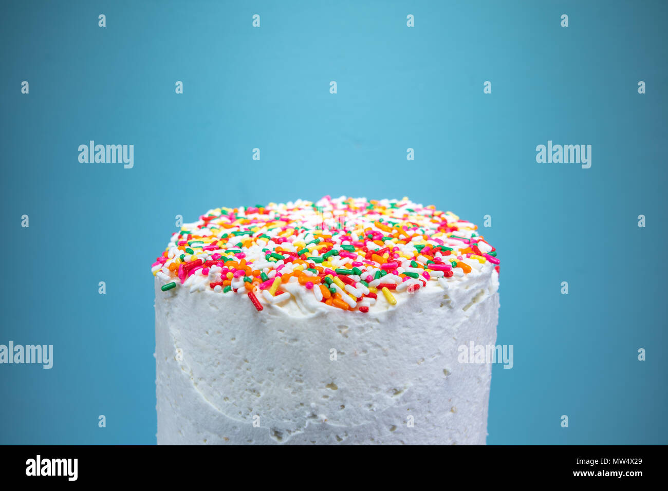 Rainbow Sprinkles on Light Blue Background with highlighting effect ...