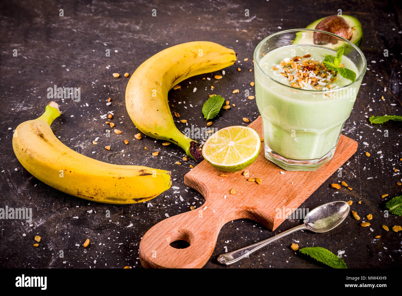Healthy summer drink, avocado and banana smoothie with lime, granola ...