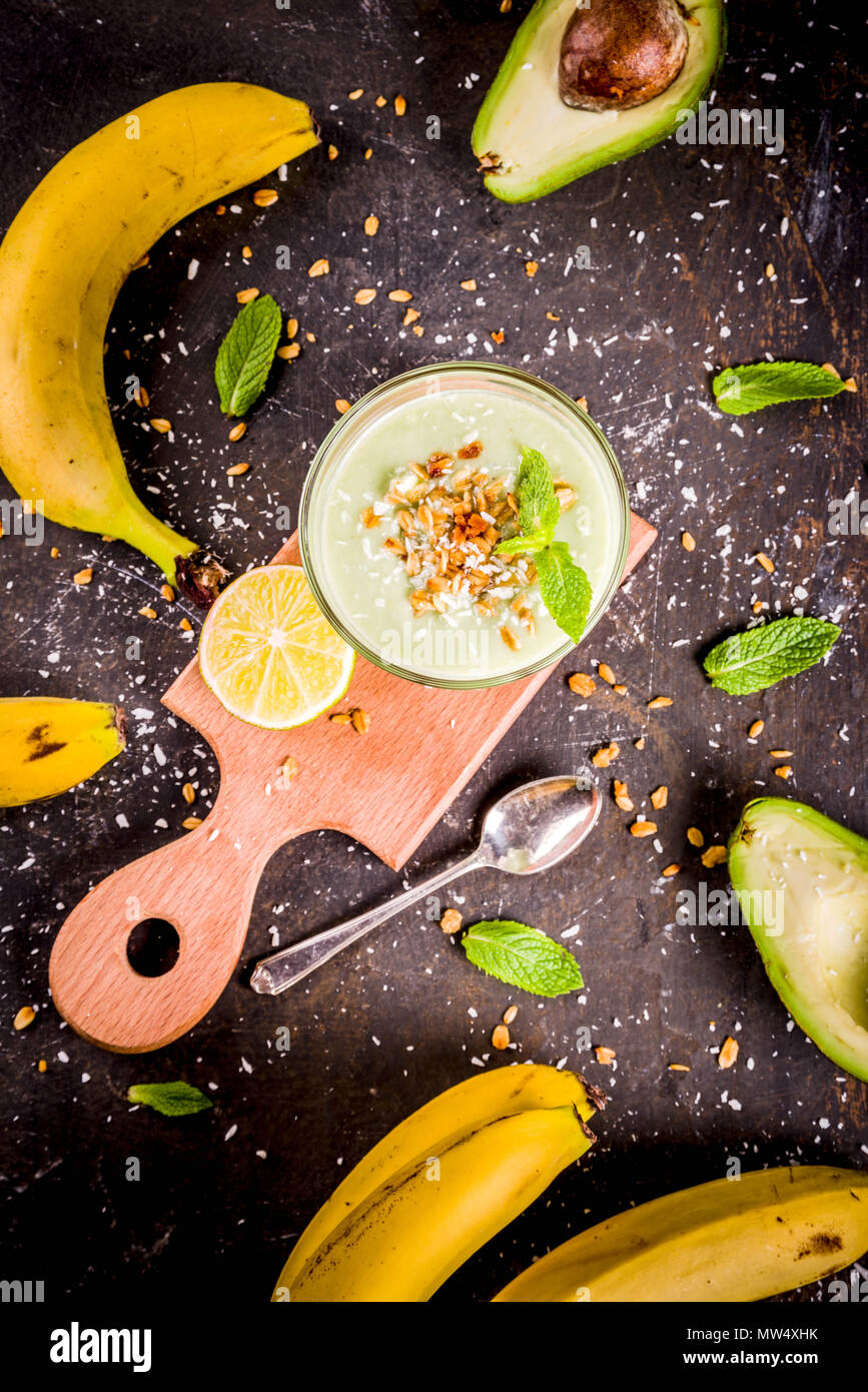 Healthy summer drink, avocado and banana smoothie with lime, granola ...