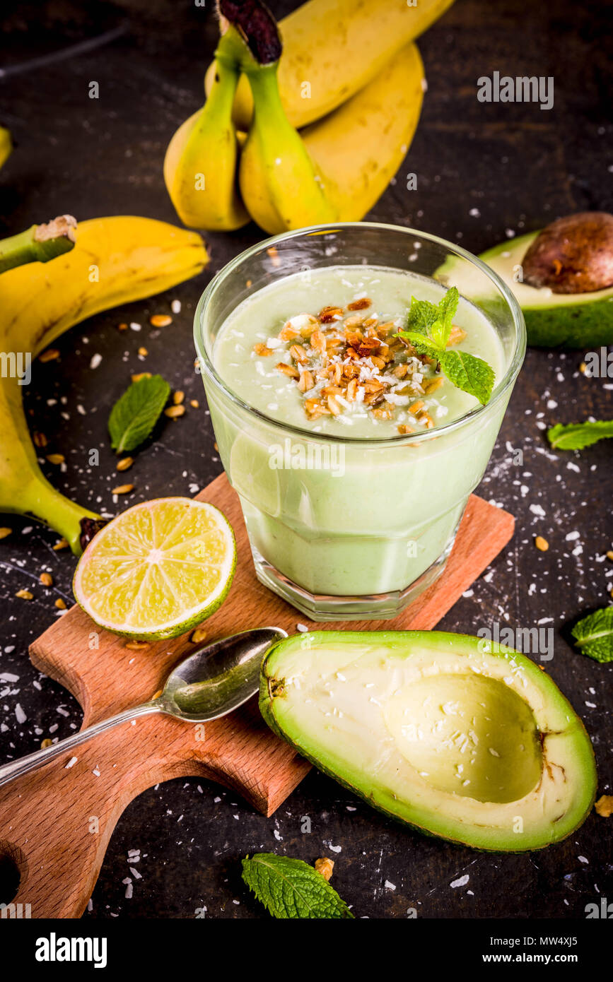 Healthy summer drink, avocado and banana smoothie with lime, granola ...