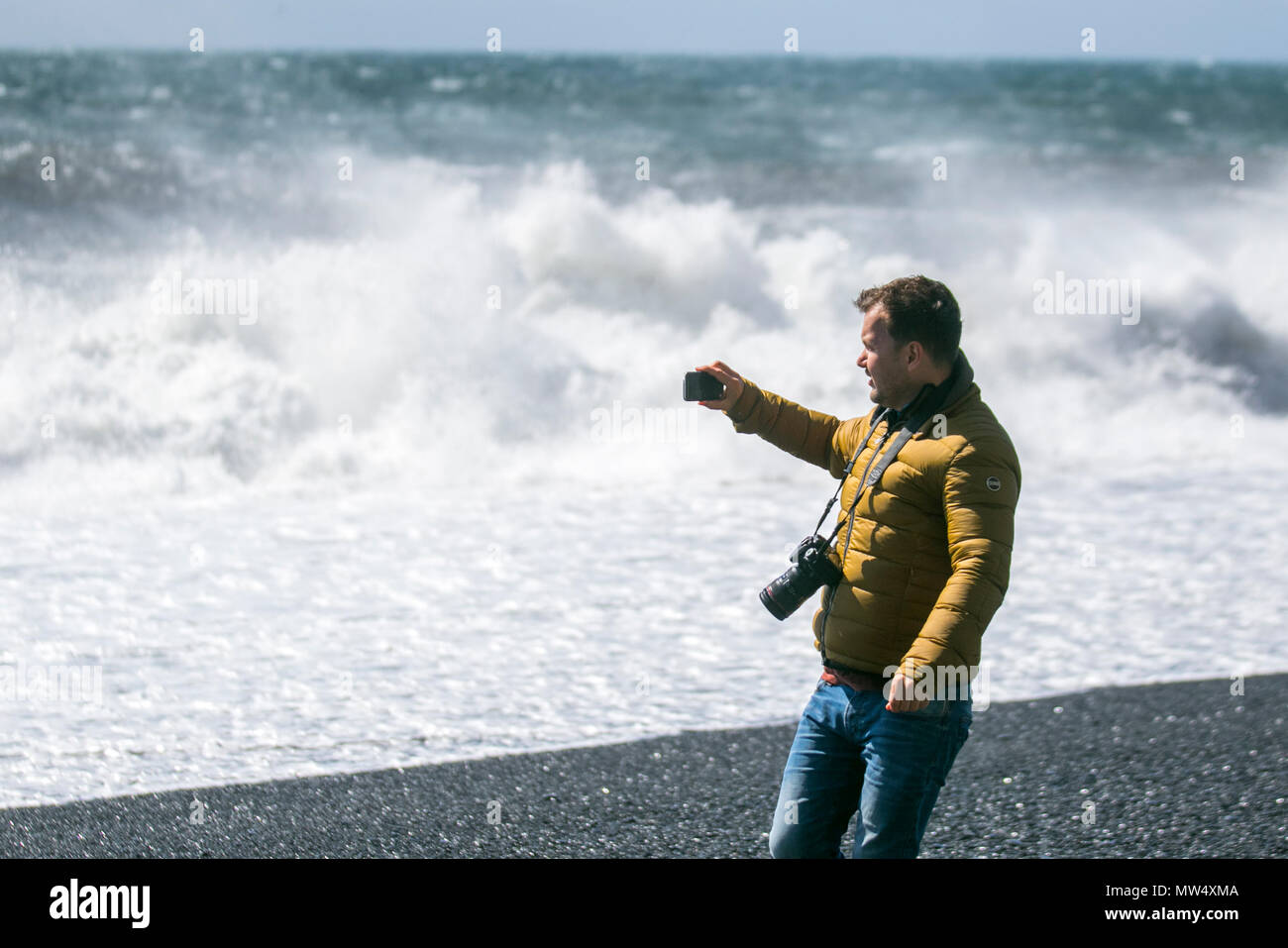 Storm force waves and raging seas on the coastline at Vik, Reynisfjara ...